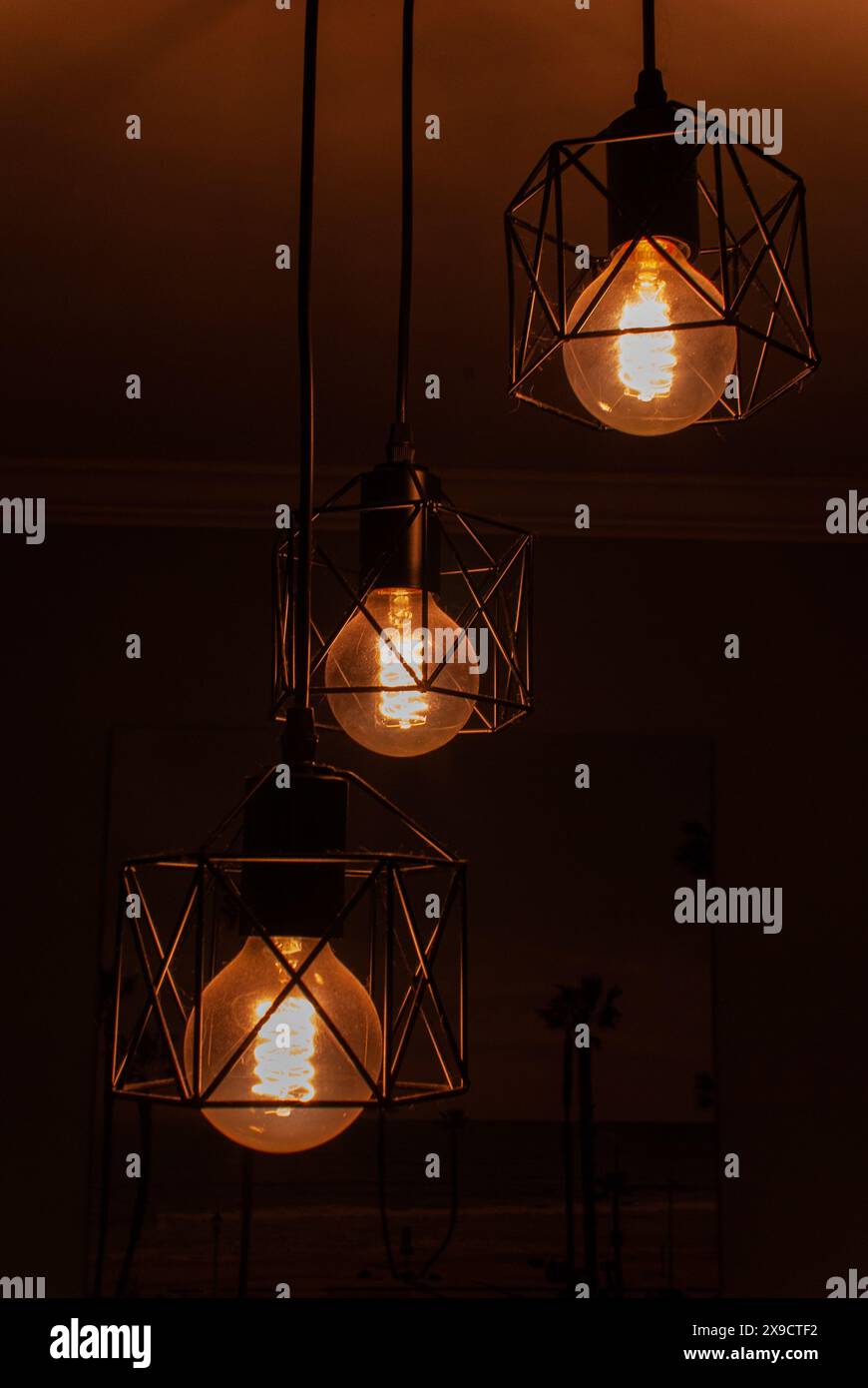 Low light photo of lightbulb filament Stock Photo - Alamy
