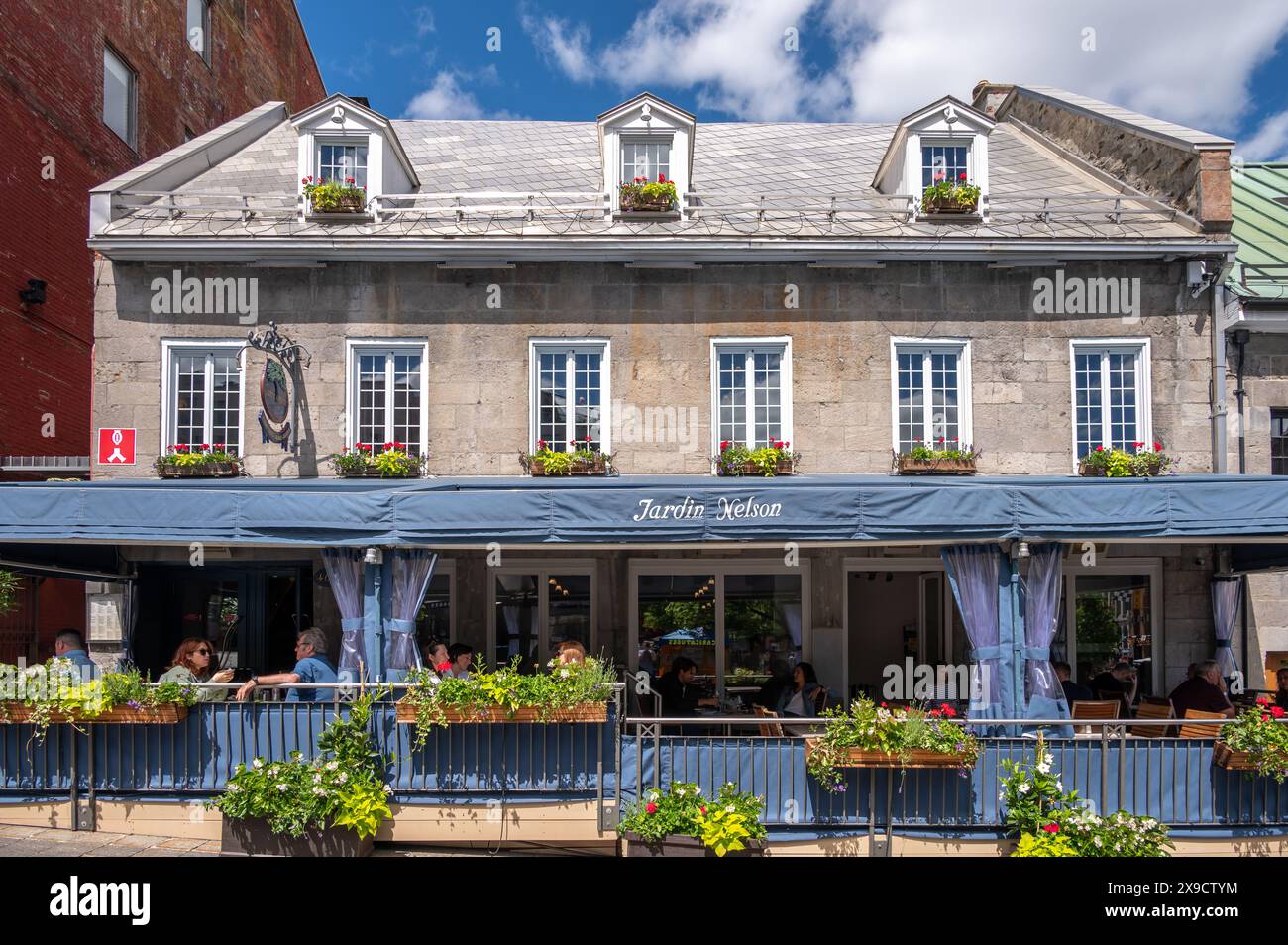 Montreal, Quebec - May 24, 2024: Jardin Nelson restaurant on Place ...