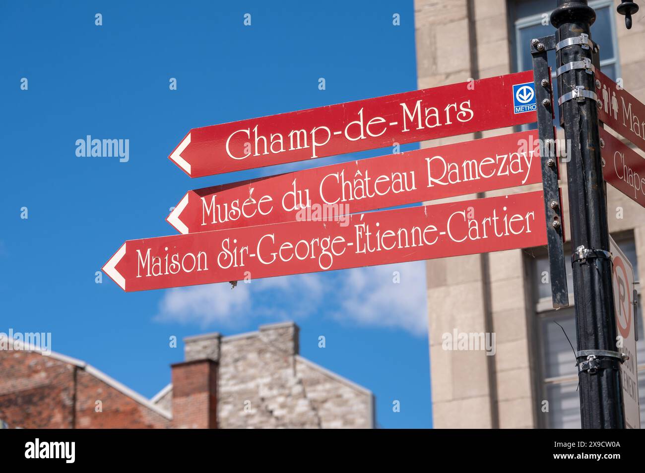 Montreal, Quebec - May 24, 2024: Streets signs in Place Jacques Cartier ...
