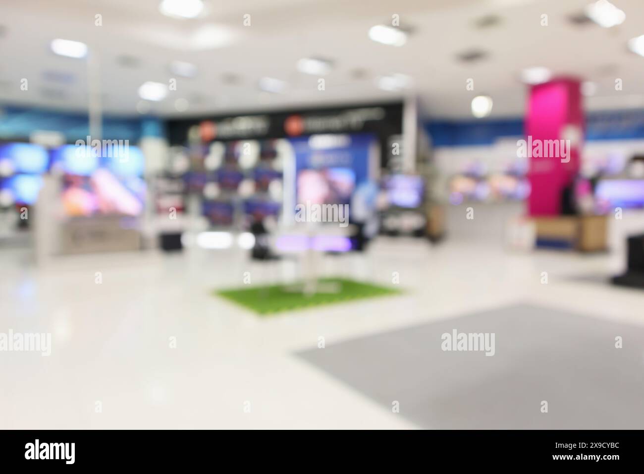 eletronic department store show Television TV and home appliance with bokeh light blurred ...