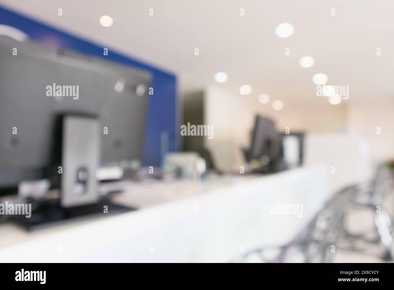 Abstract blur office desk workplace or hospital with computer defocused ...
