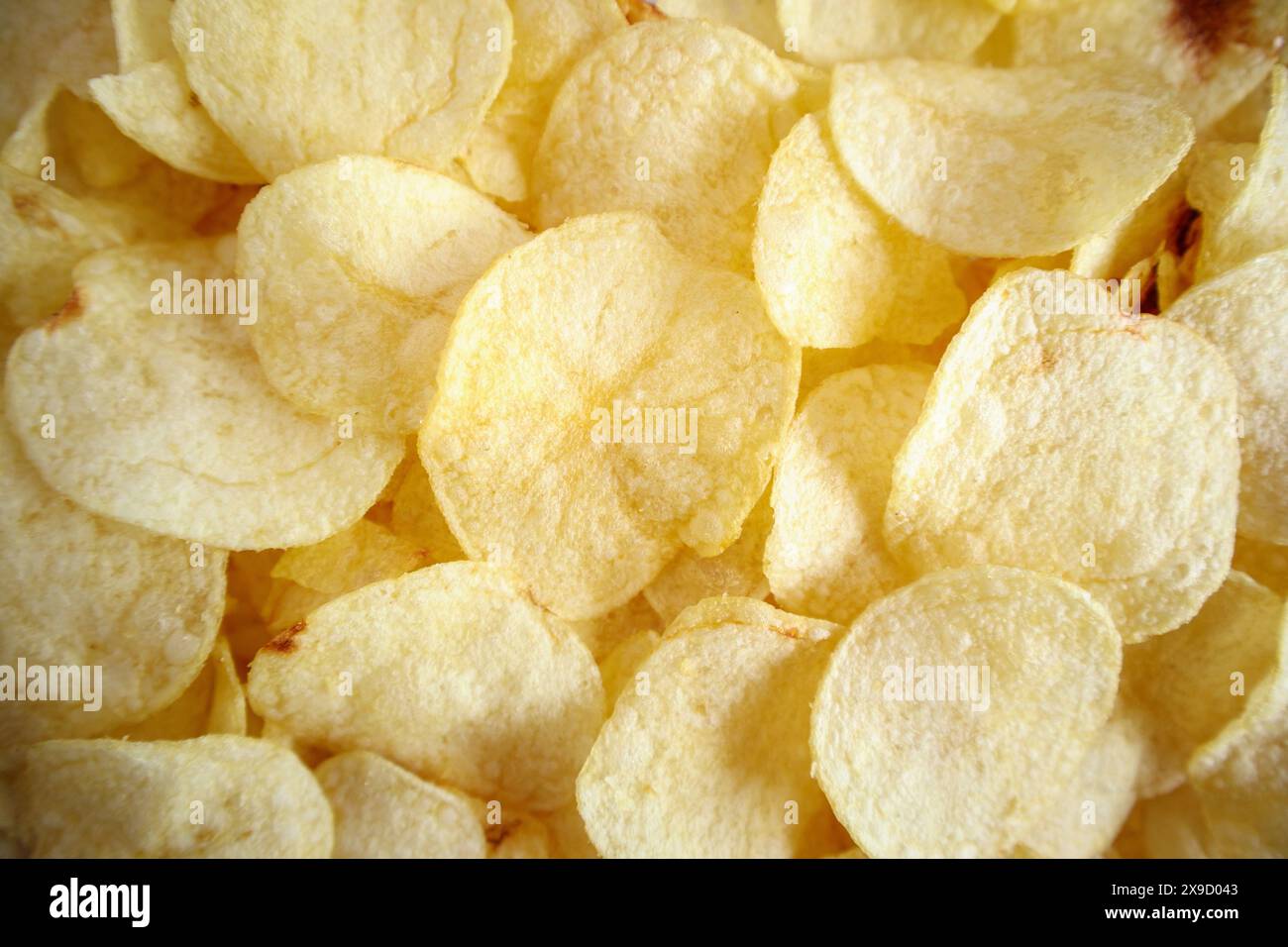 crispy potato chips snack texture background Stock Photo - Alamy