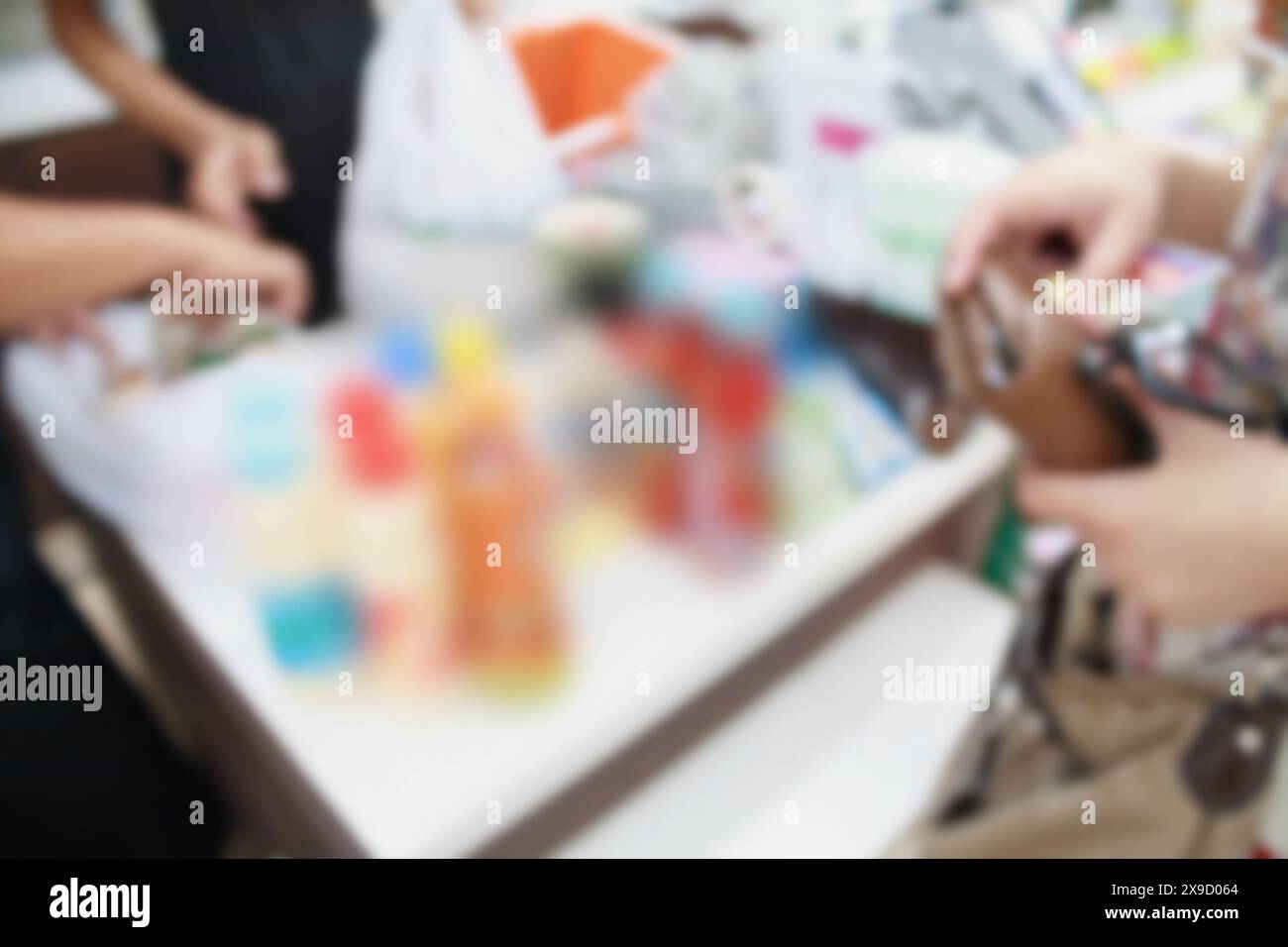 convenience store cashier with customers blur background Stock Photo ...