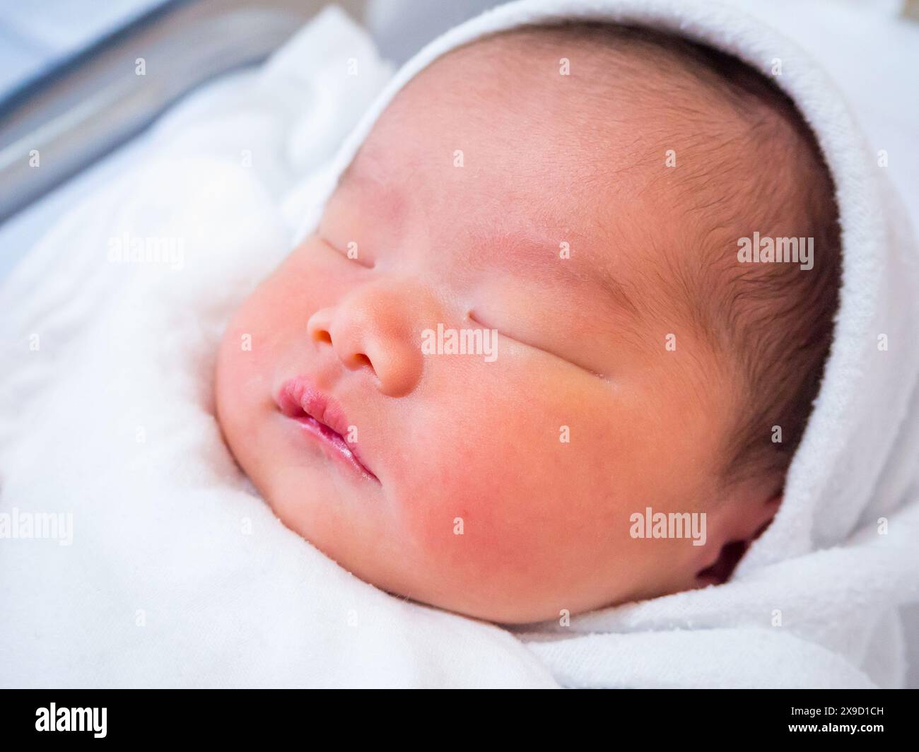 Cute newborn asian baby girl sleeping Stock Photo - Alamy
