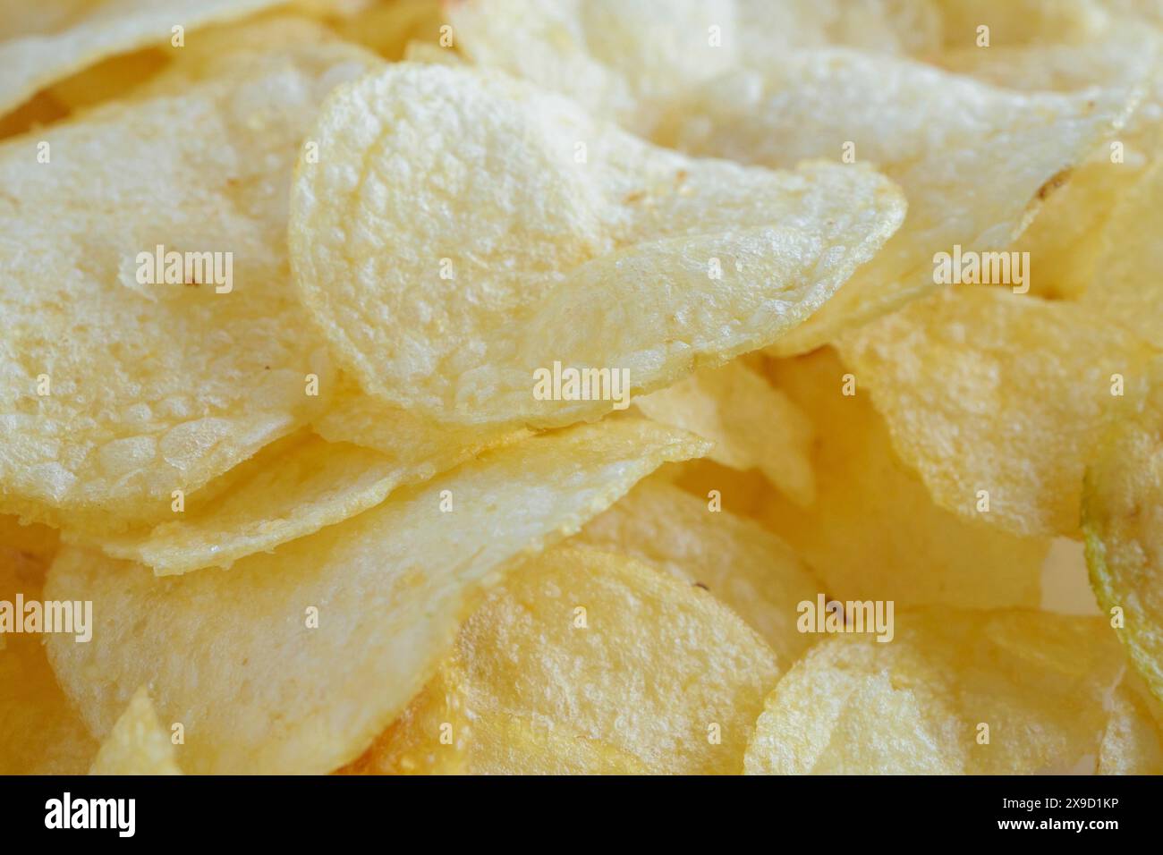 crispy potato chips snack texture background Stock Photo - Alamy