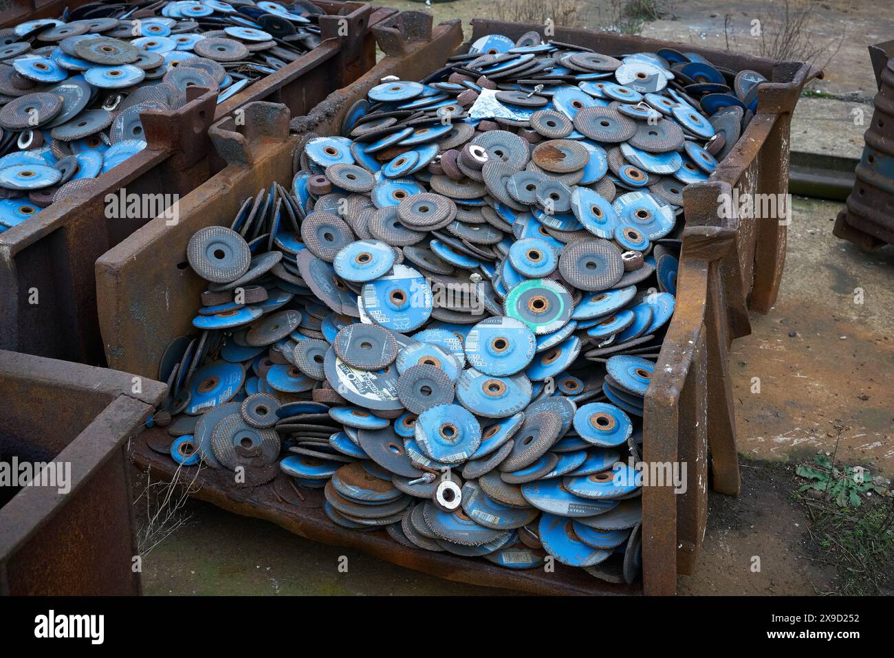 Worn, disused cutting-off wheels for metalworking on the site of an ...