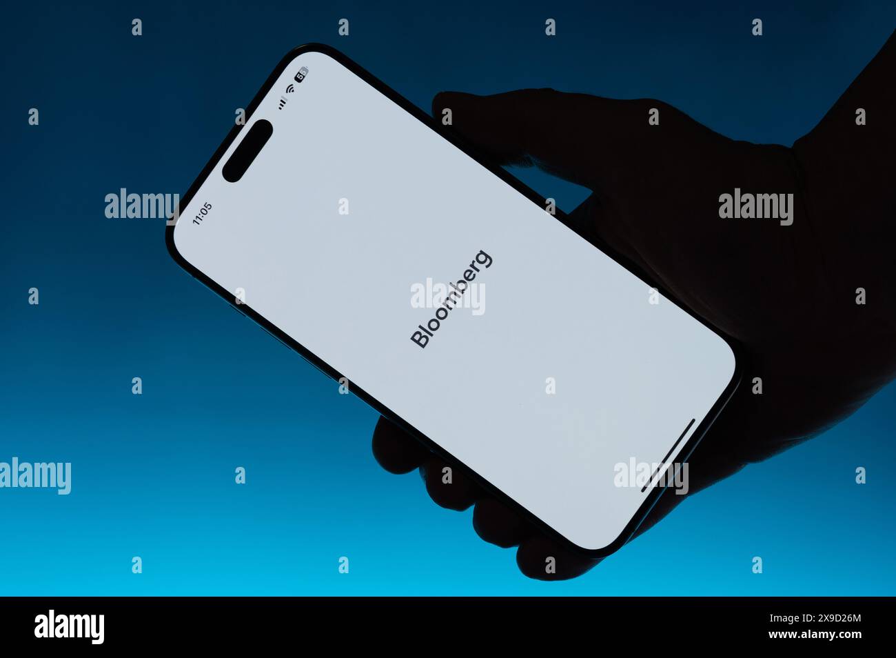 New York, USA - May 6, 2024: Open Bloomberg app on smartphone in hand ...