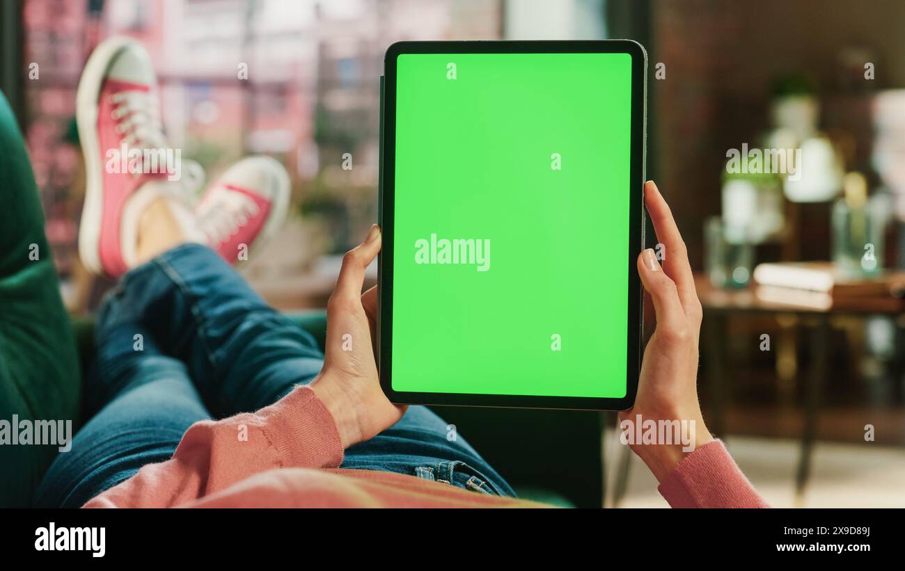 Blogger vertically holding green screen hi-res stock photography and ...