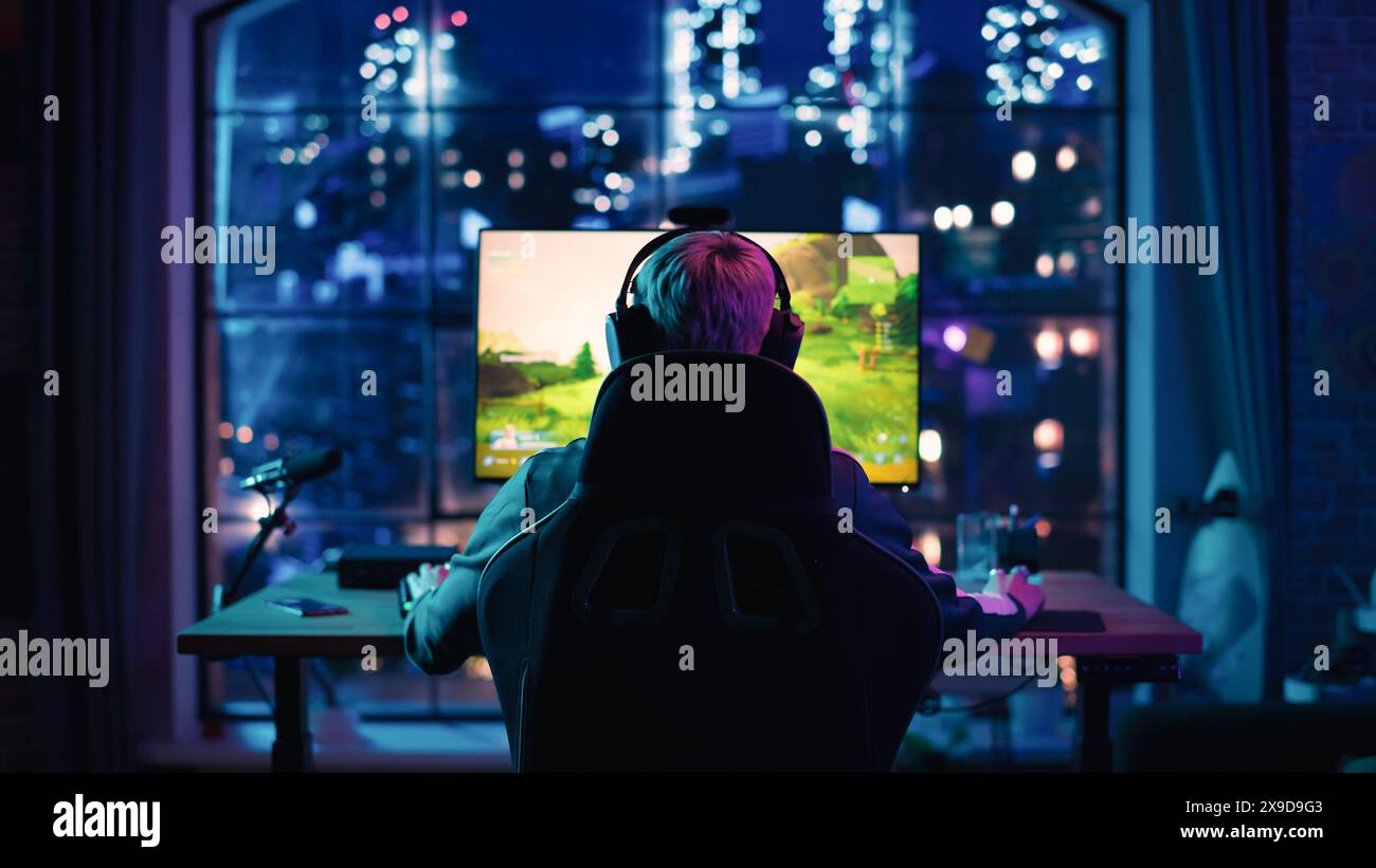 Back View: Professional Female Gamer Playing a Video Game on Personal ...