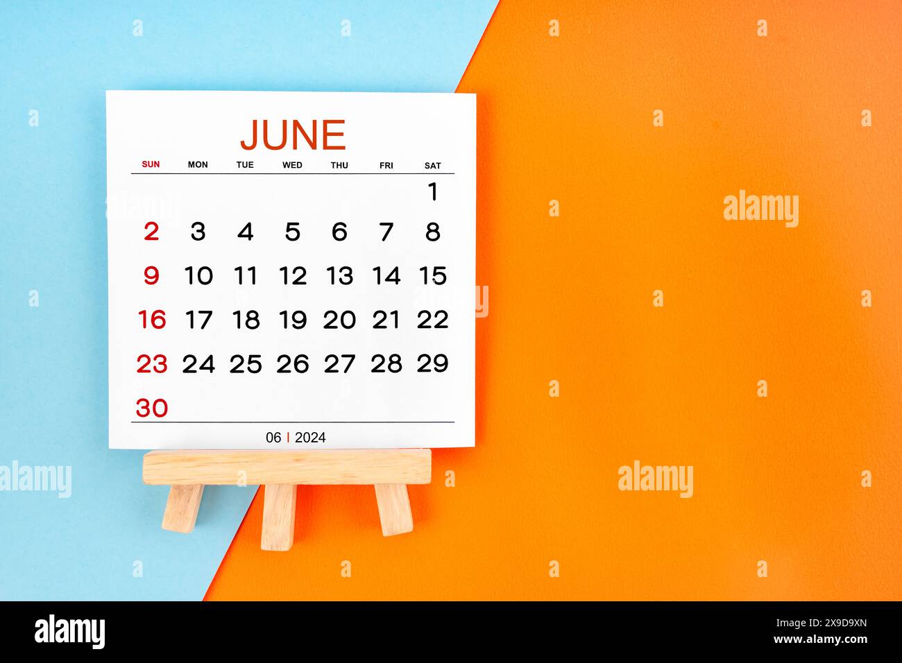 2024 June calendar page on blue and orange color background Stock Photo ...