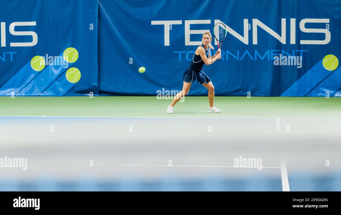 Female Tennis Player Waiting for Opponent to Shoot Ball with a Racquet ...