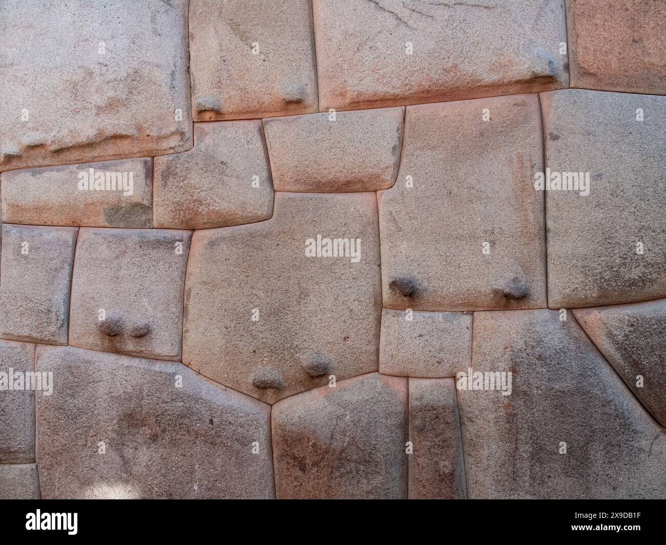 Inca stone work showing stones of various angles Stock Photo - Alamy