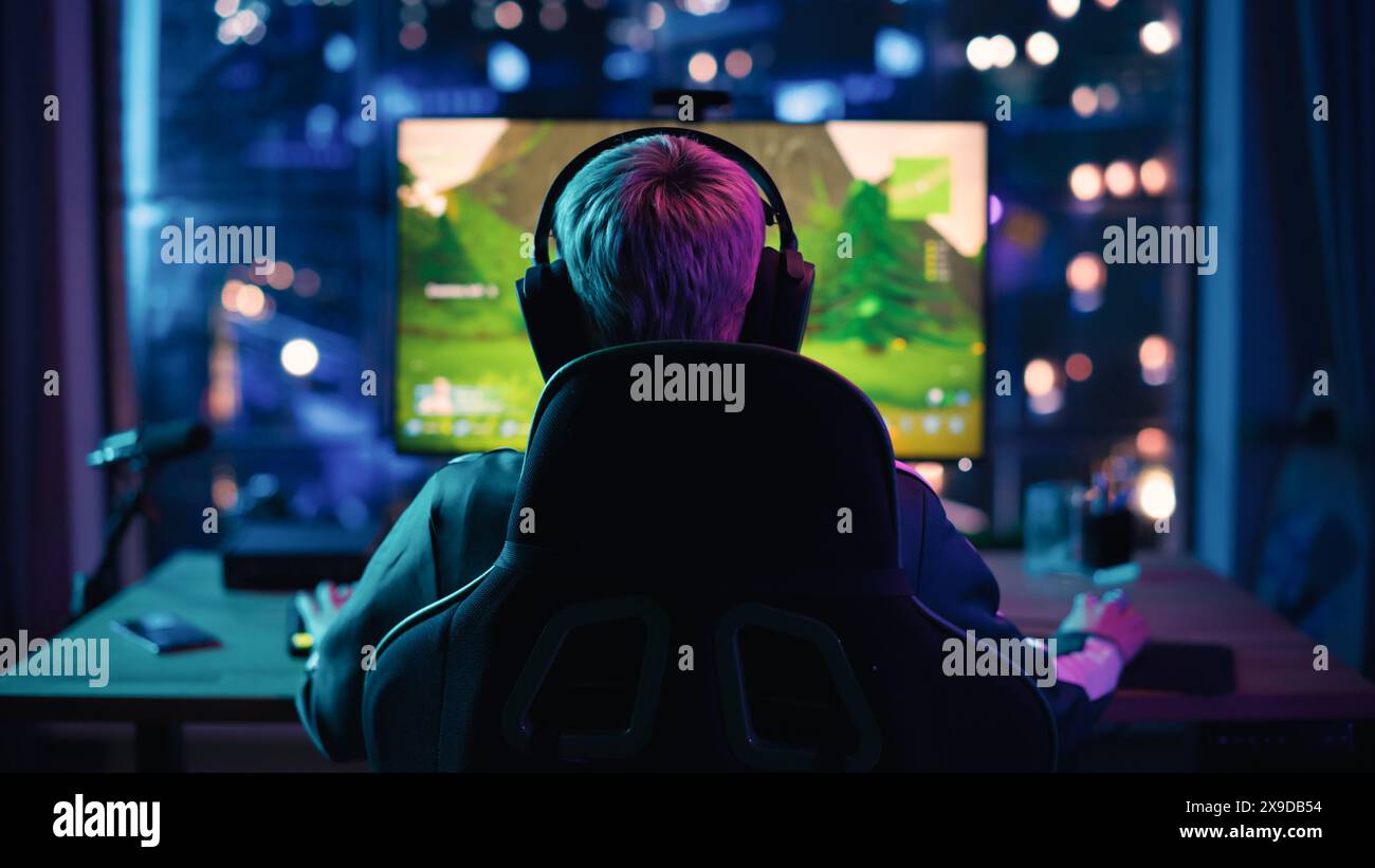 Back View: Professional Female Gamer Playing a Video Game on Personal ...