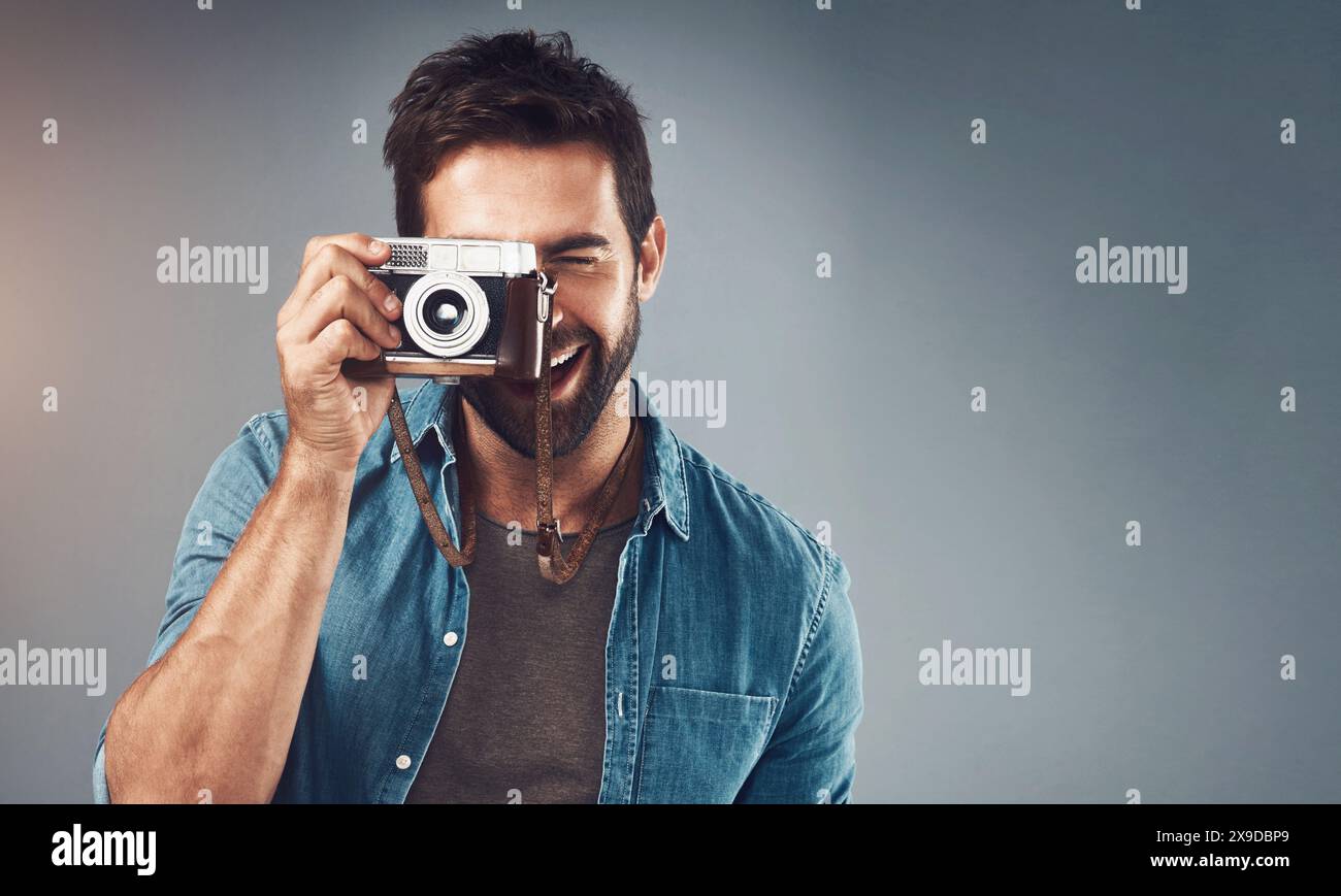 Vintage, camera and man as photographer in studio for photoshoot ...