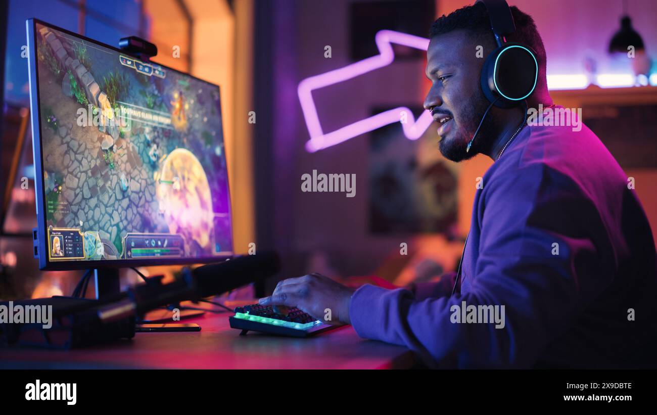 Gaming at Home: Black Gamer Playing Online Video Game on Personal ...