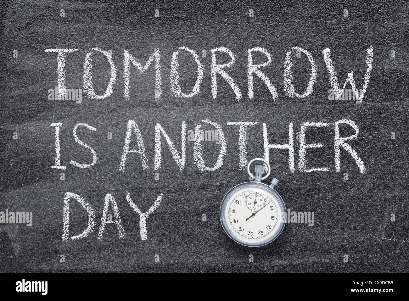 tomorrow is another day phrase written on chalkboard with vintage ...