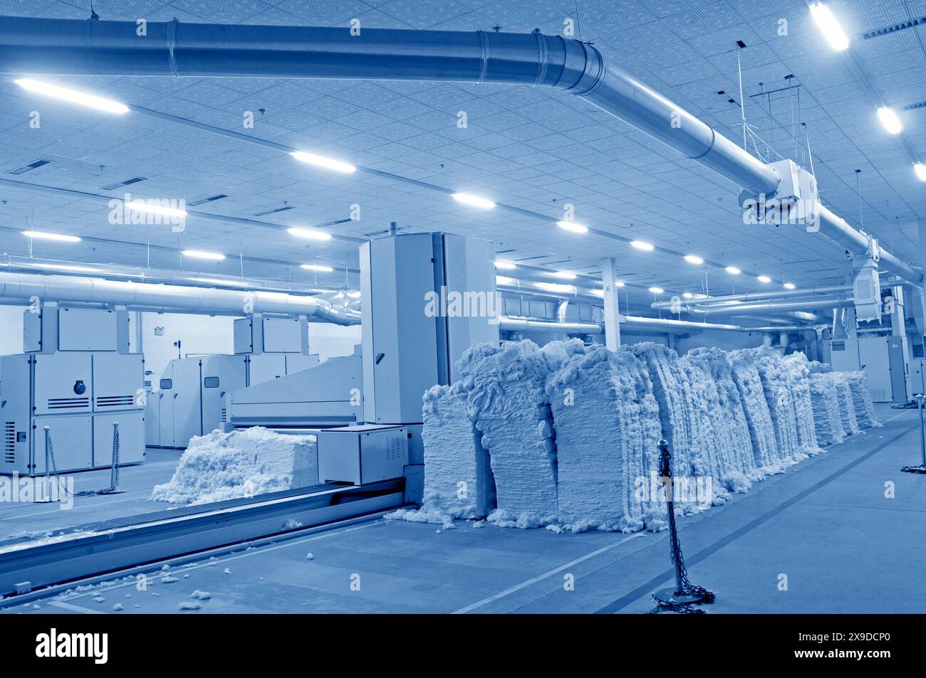 Cotton group in spinning production line factory Stock Photo - Alamy