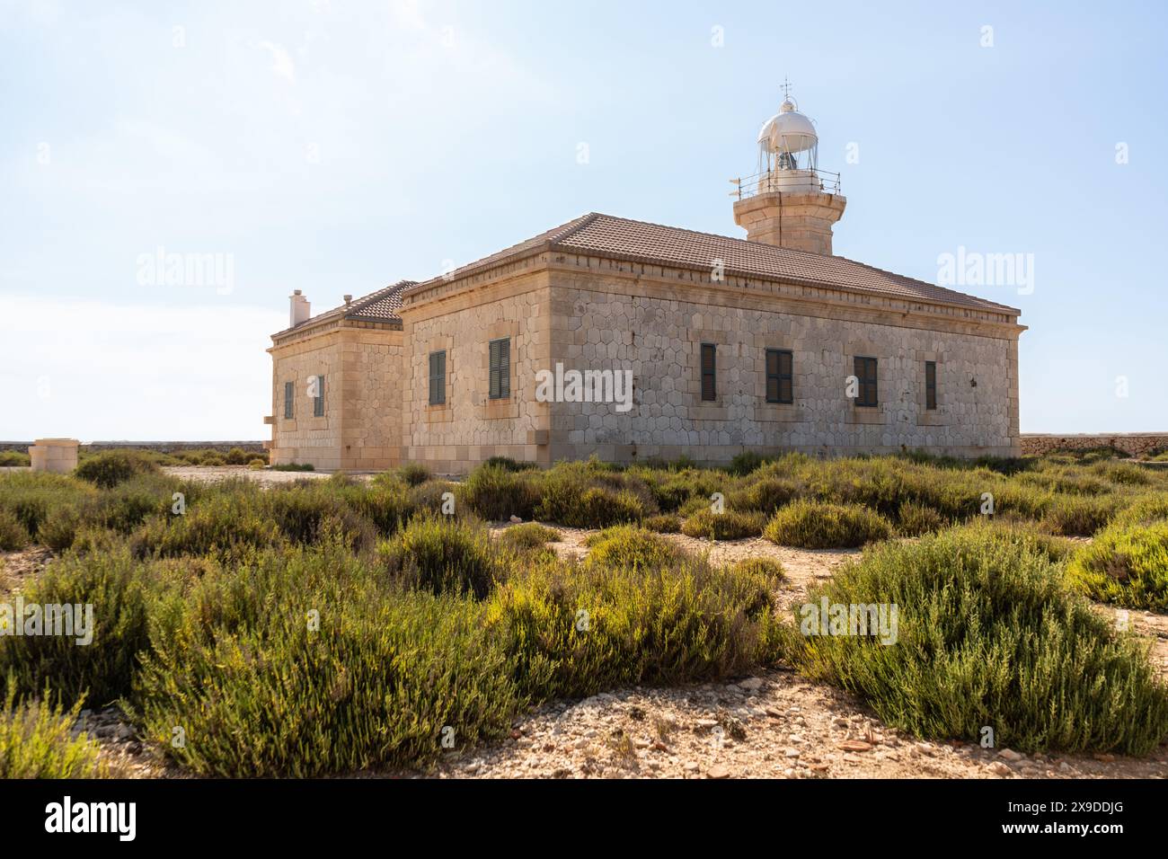 Building exterior of lighthouse of Punta Nati in northern Menorca ...