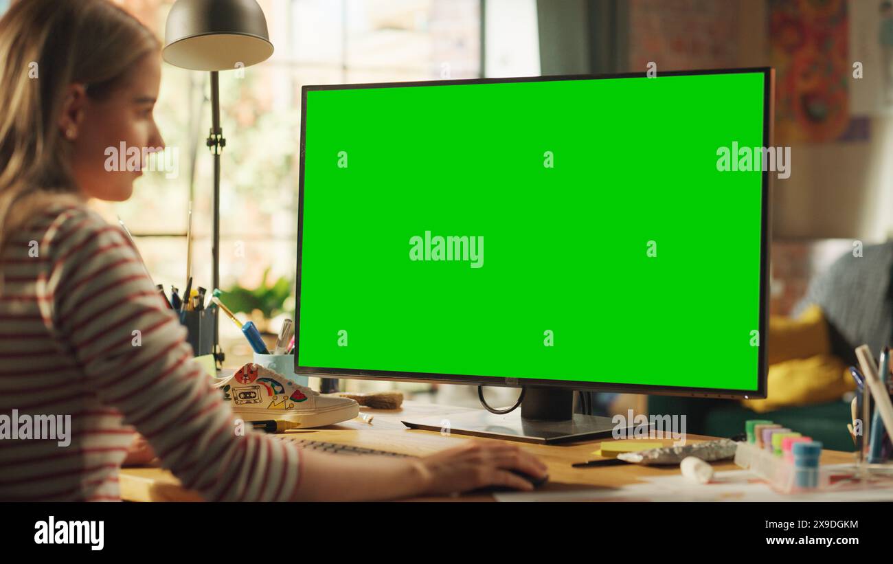 Blonde Female Creator Modelling on Desktop Computer with Green Screen ...