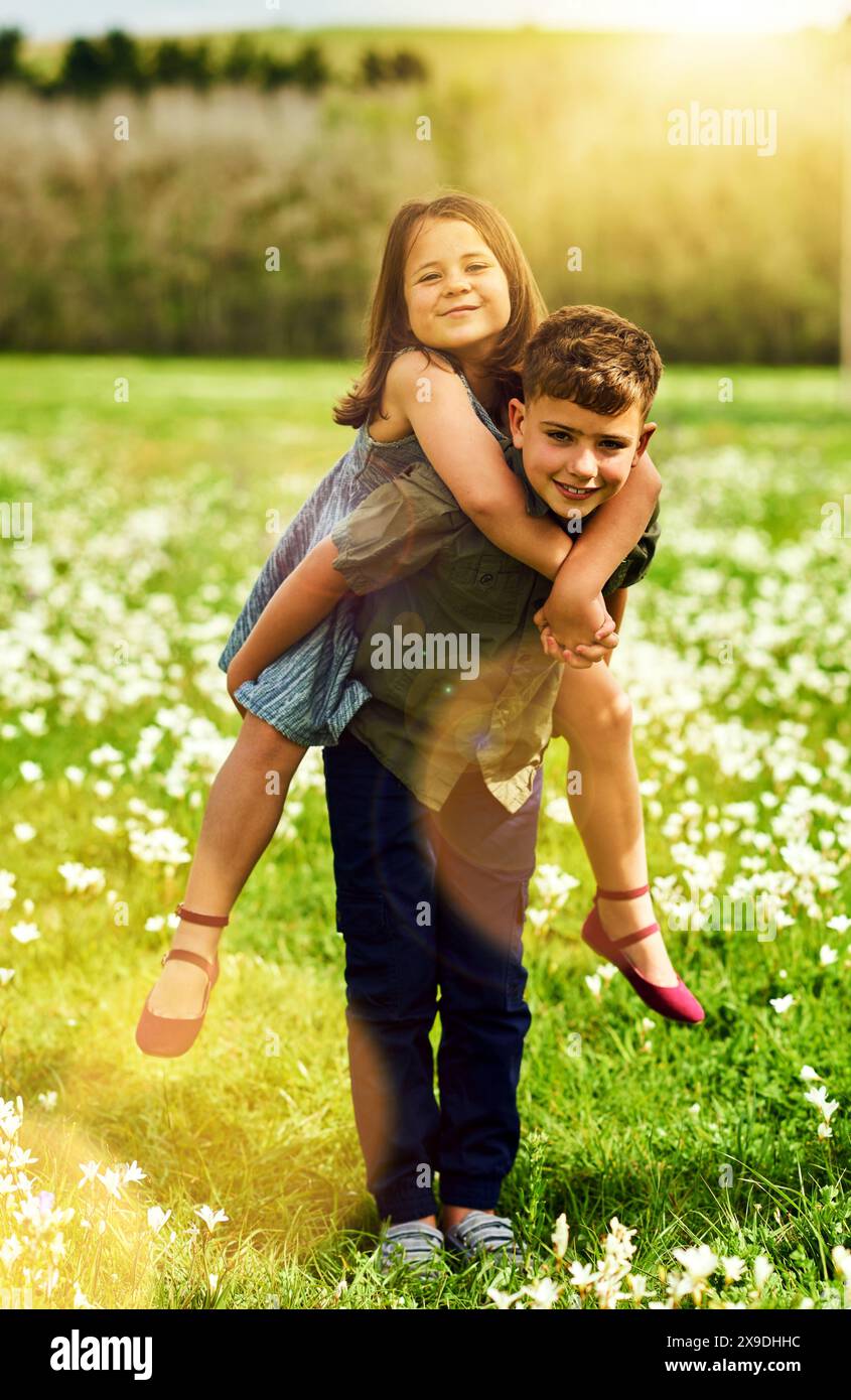 Siblings, portrait and piggyback with smile in park together for ...