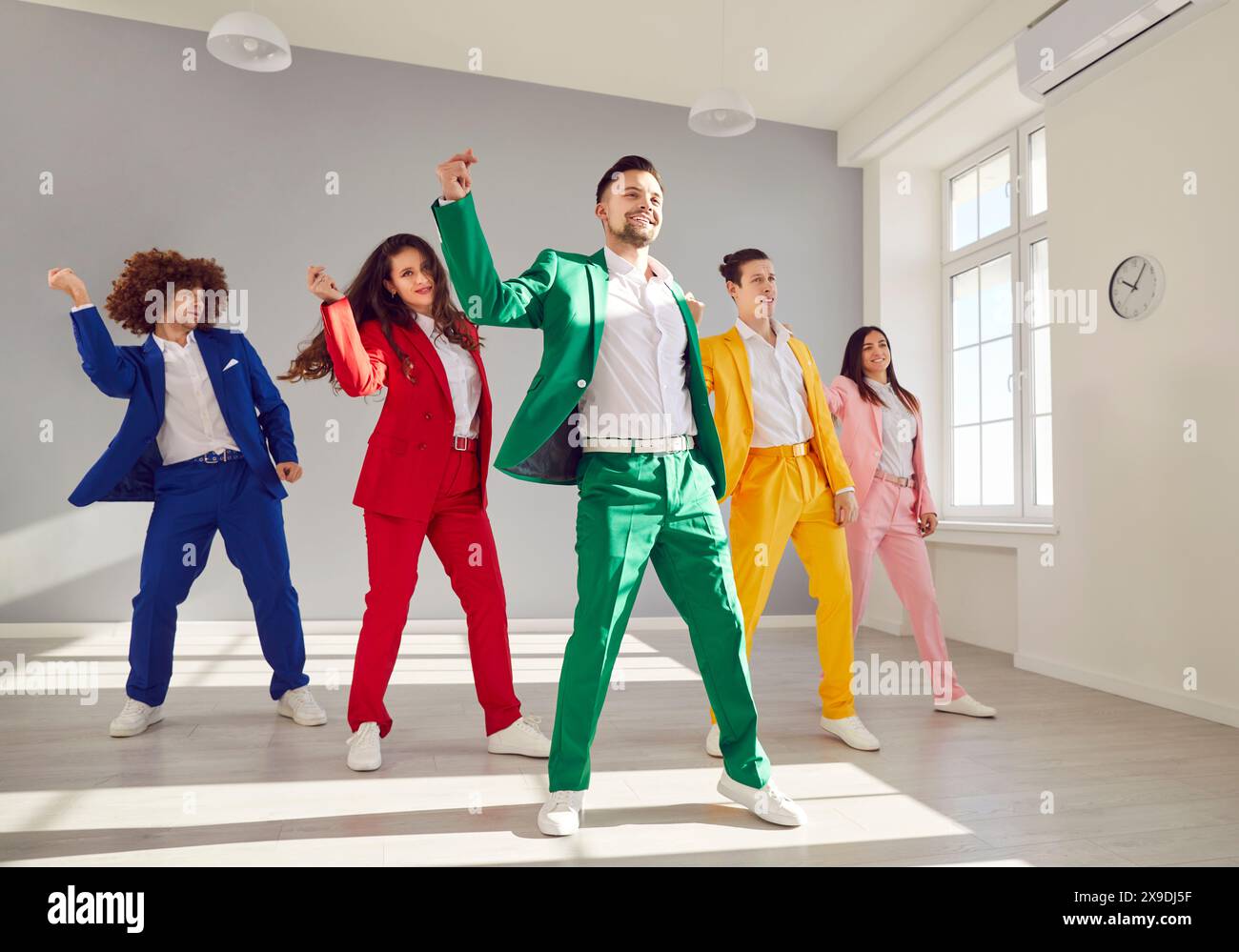 Diverse group smiling friends dancing hi-res stock photography and ...