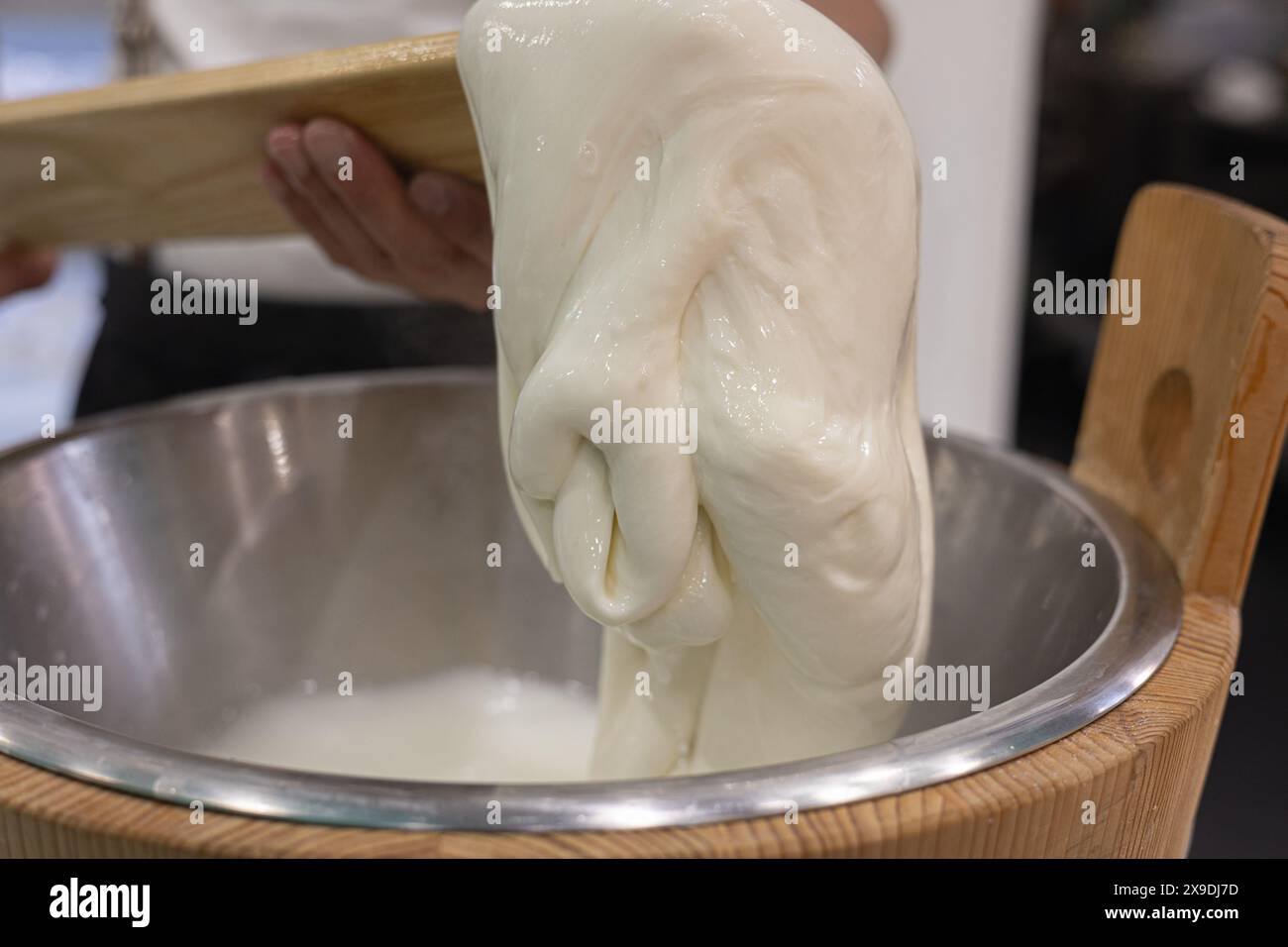 Production and Manual Production of Italian Mozzarella Stock Photo - Alamy