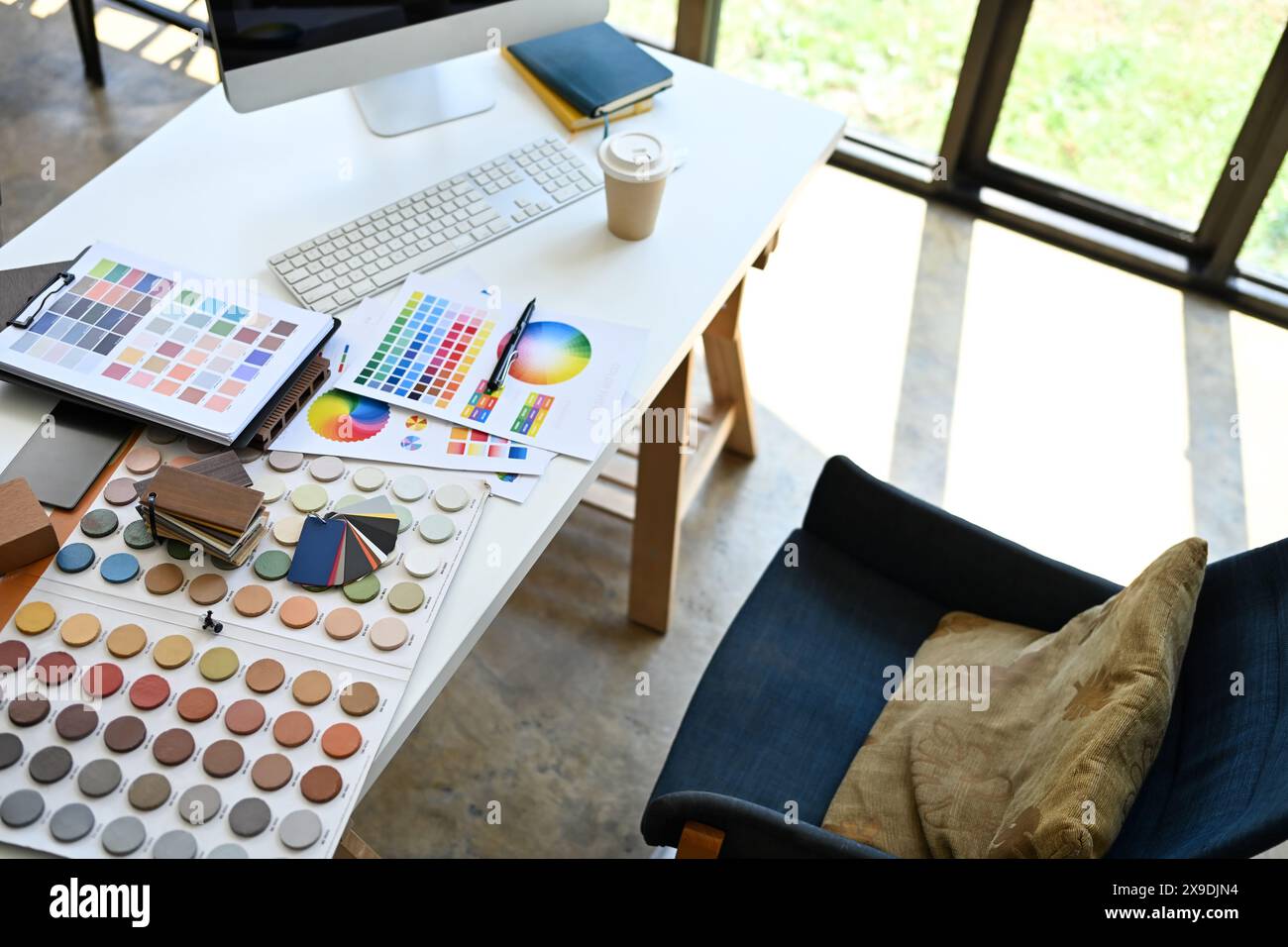 Above view of Interior designer working table with material sample and ...