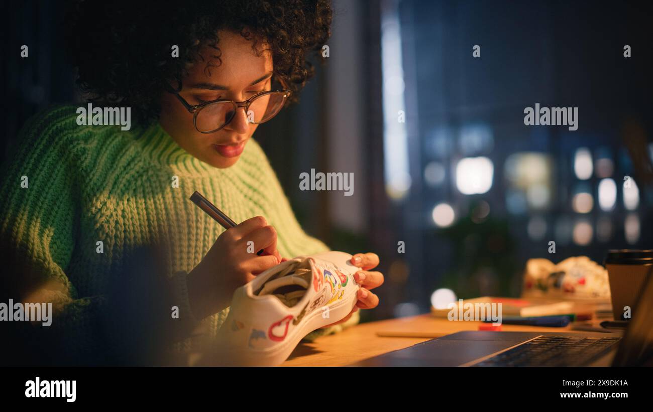 Female designer puts patterns hi-res stock photography and images - Alamy