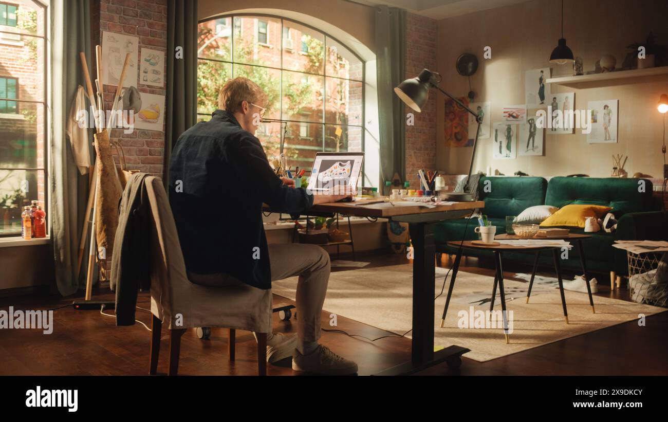 Handsome Teenage Man Designing Video Game Clothing on His Laptop. Cool ...