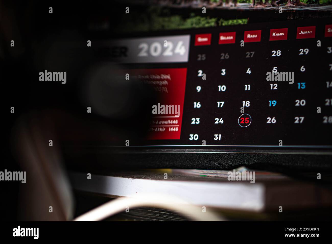 Close-up of a 2024 calendar showing the month of December with dates ...