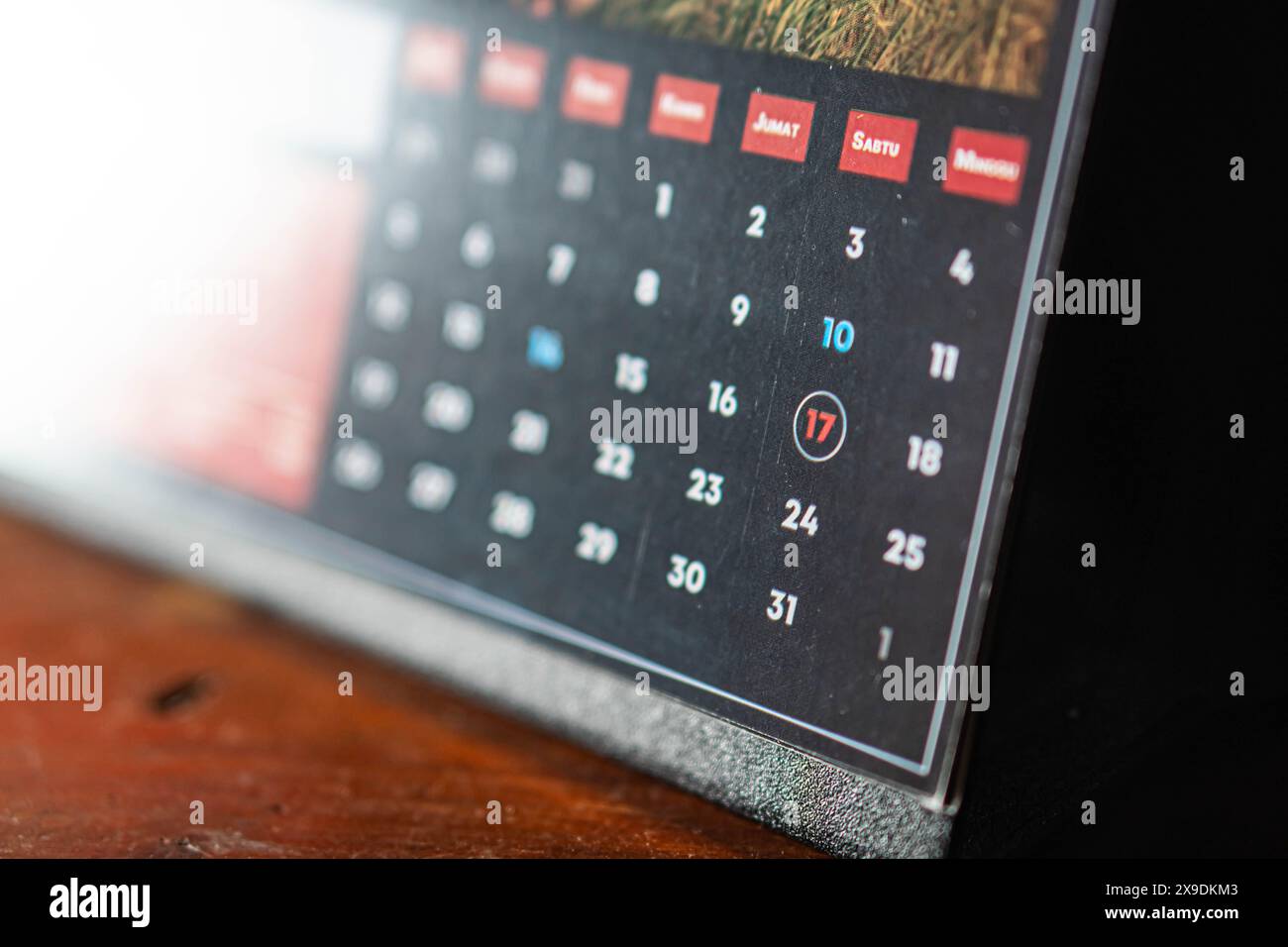 Close-up of a desk calendar showing a month with dates from 1 to 31 ...