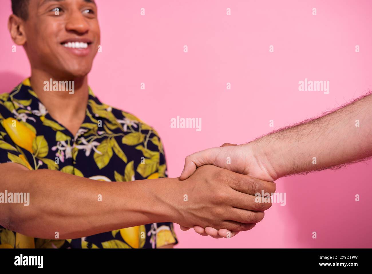 Two business people doing handshake hi-res stock photography and images ...