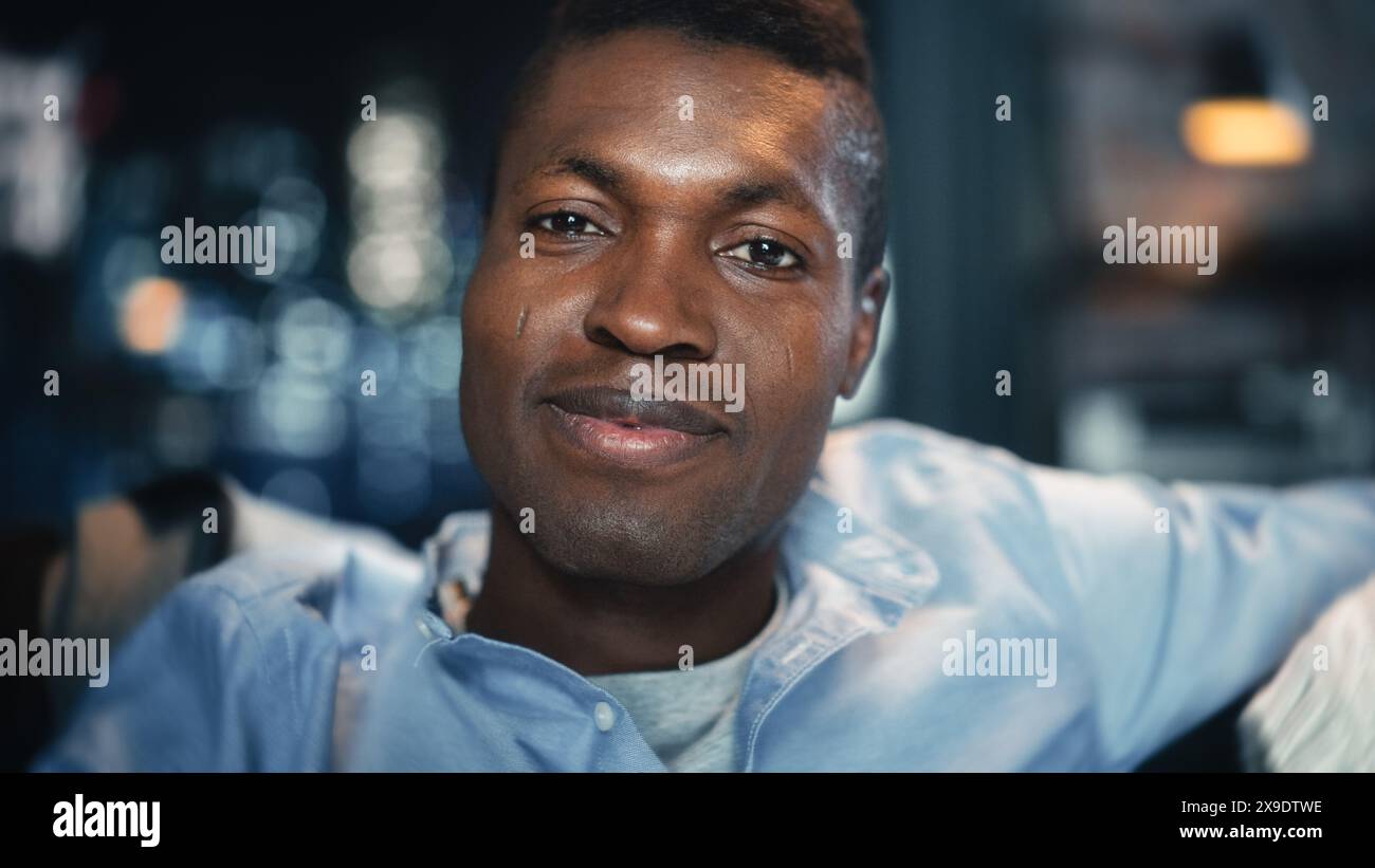 Young man watching something funny hi-res stock photography and images ...