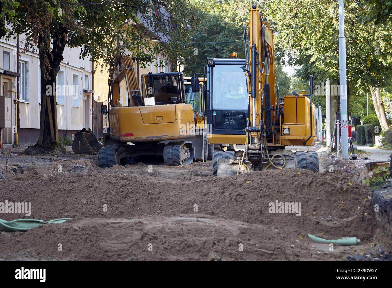 Construction site with earthmoving equipment. Repairing the roadway on ...