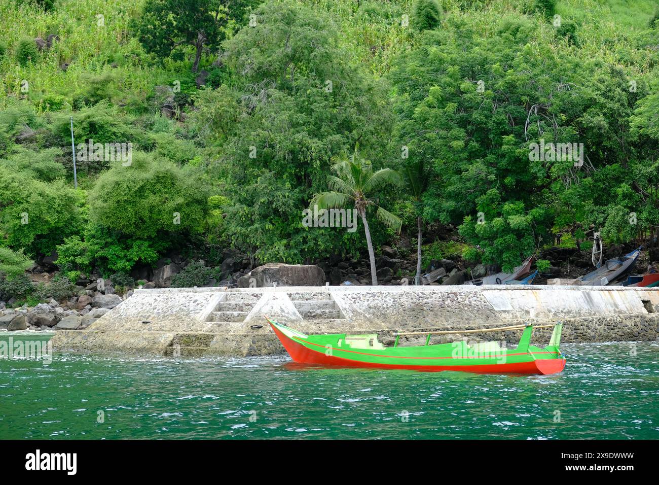 Indonesia Alor Island - Village jetty with traditional boat Stock Photo ...