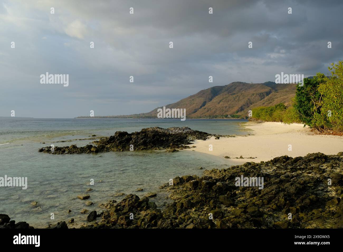 Indonesia Alor Island - Ocean landscape with volcanic rocks Stock Photo ...