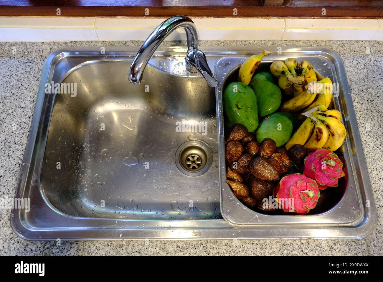 Indonesia Batam tropical fruits in kitchen sink Stock Photo - Alamy