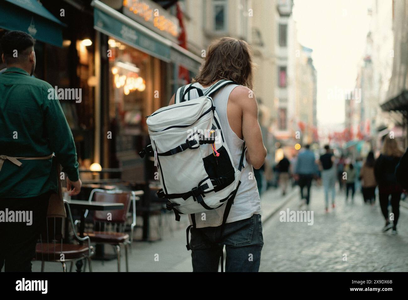 Man walks around city hi-res stock photography and images - Alamy