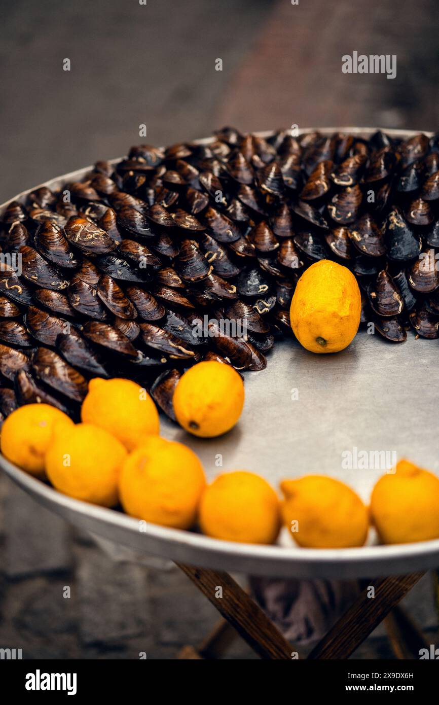 Fried mussels in a frying pan, street food in Istanbul Stock Photo - Alamy