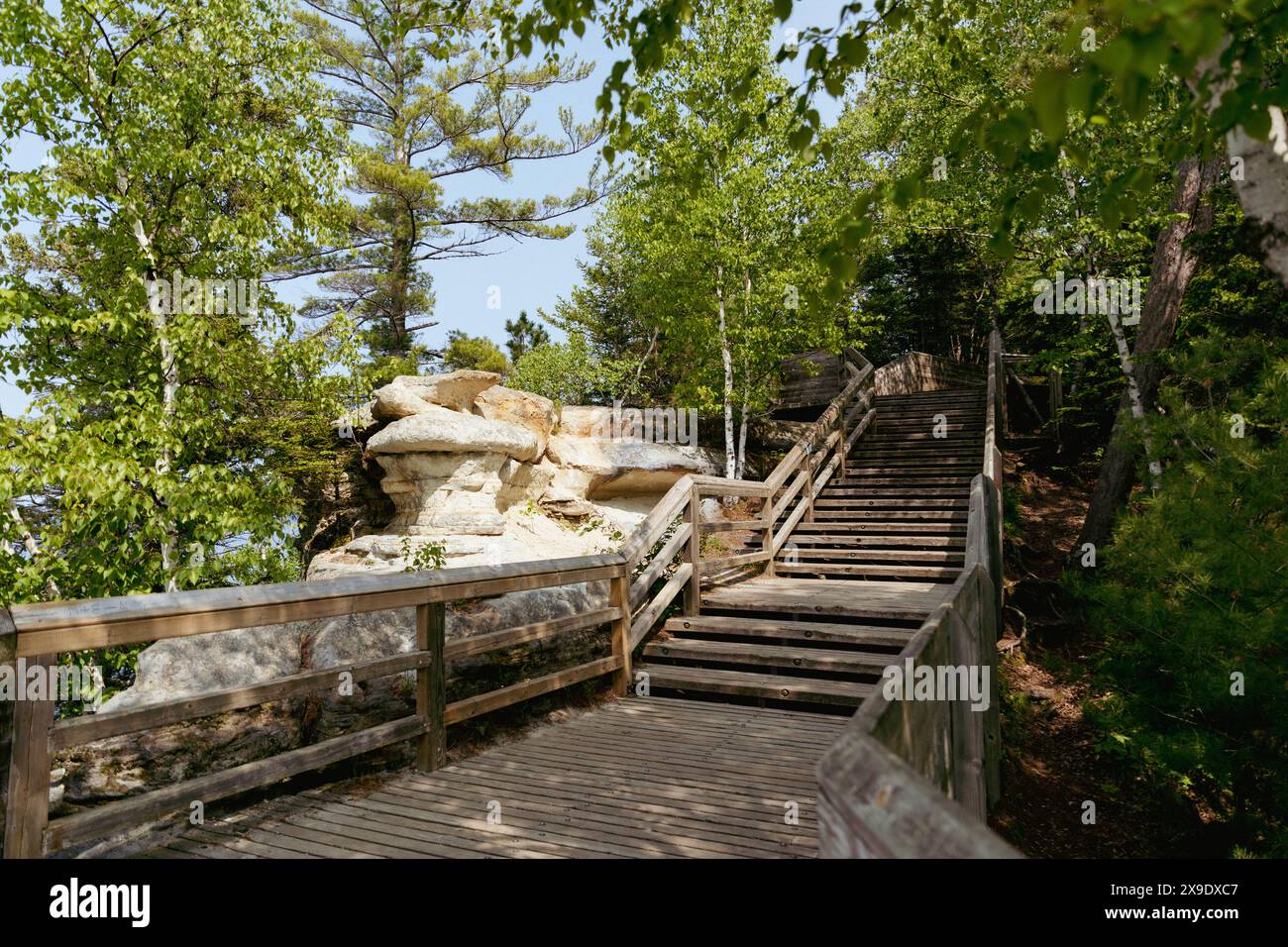 Stair winds down to an overlook of Pictured Rocks National Lake Shore ...