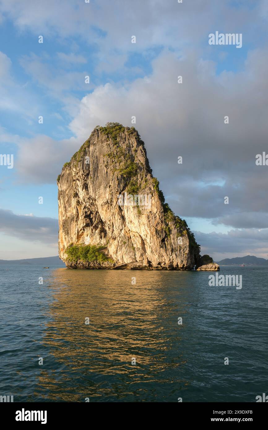 A limestone rock formation juts out of the ocean Stock Photo - Alamy