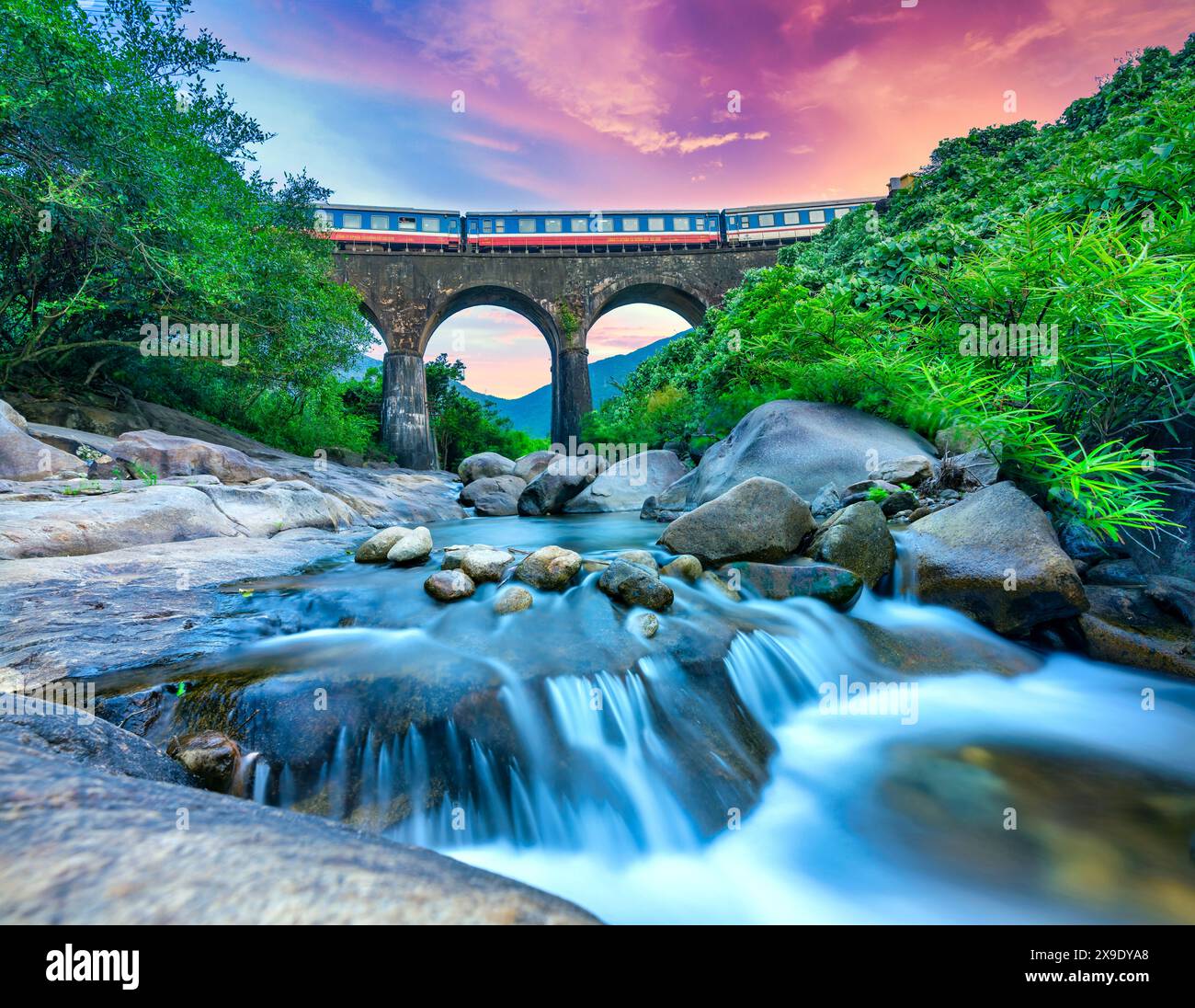 Don Ca arch bridge at Hai Van pass, Vietnam. This bridge is a part of ...