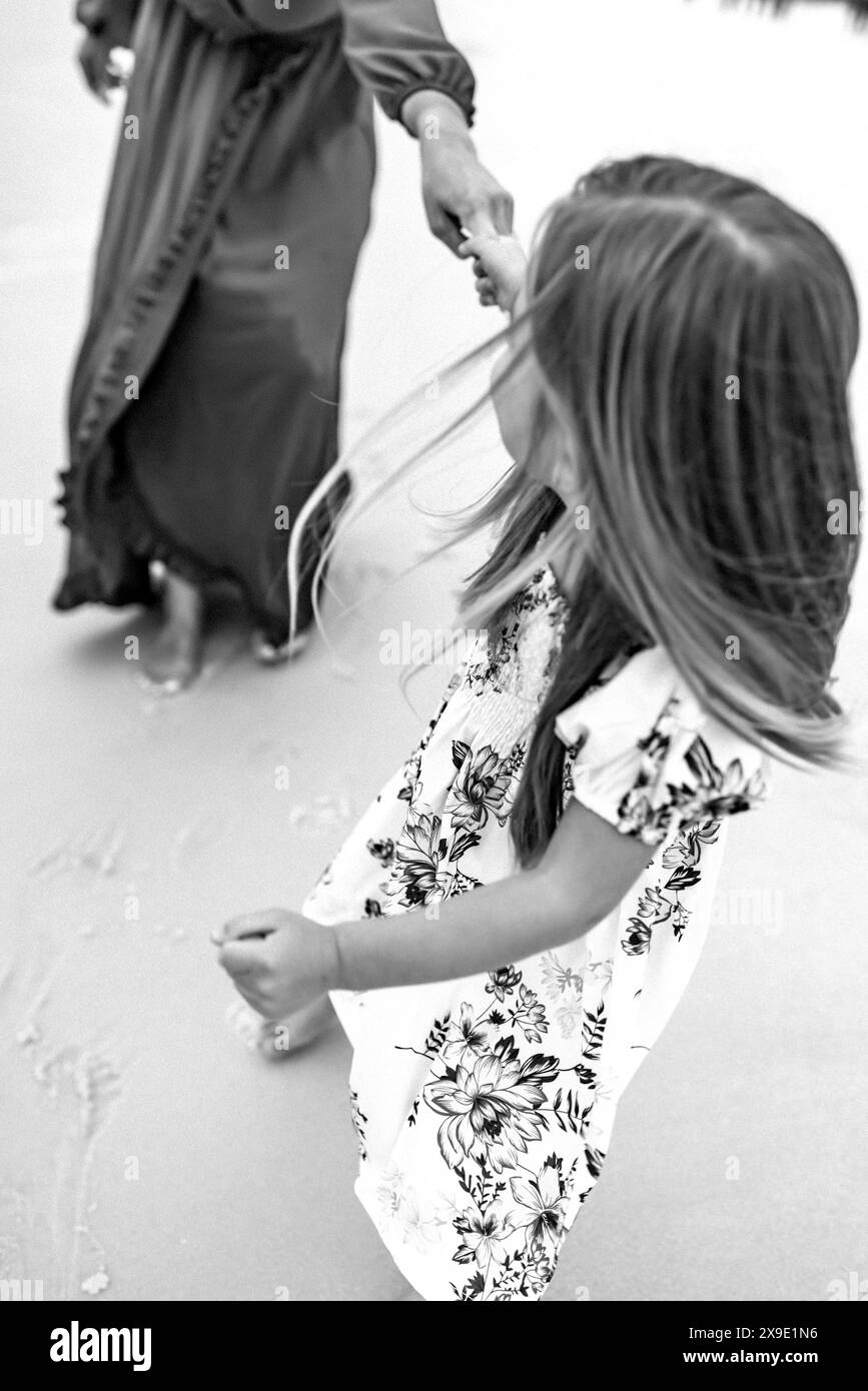 Mom and Young Girl Holding hands Stock Photo - Alamy Mom and Young Girl Holding hands Stock Photo - Alamy