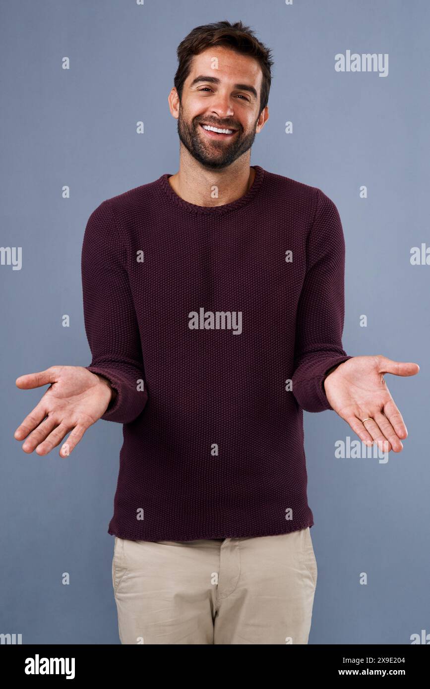 Studio, smile and gesture of man, question and confused with shrug ...