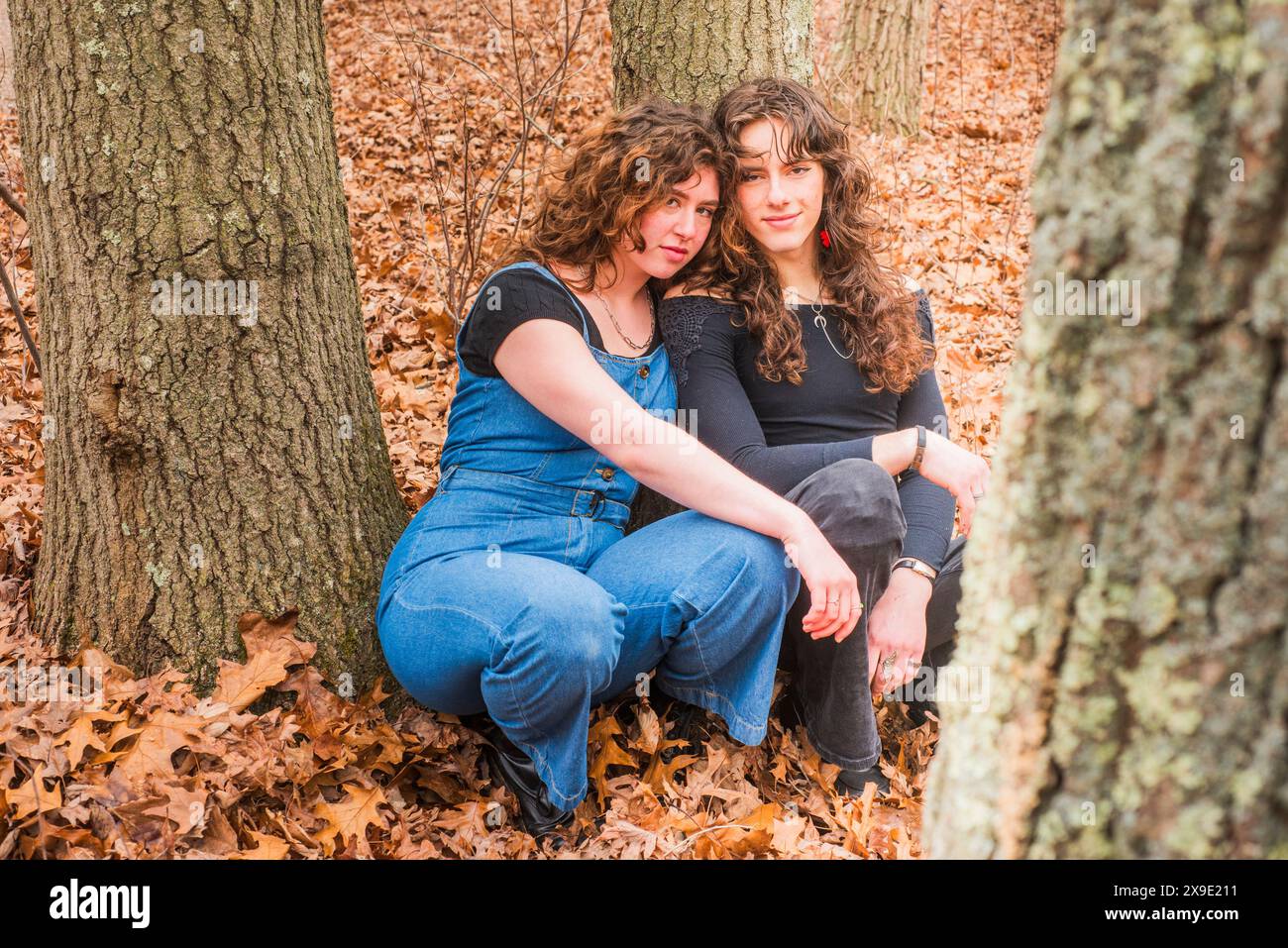 Portrait of teen siblings in woods Stock Photo - Alamy