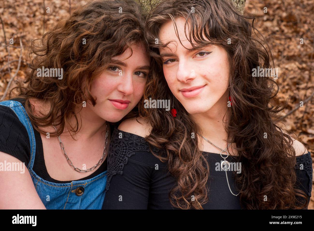 Portrait of teen siblings in the woods Stock Photo - Alamy