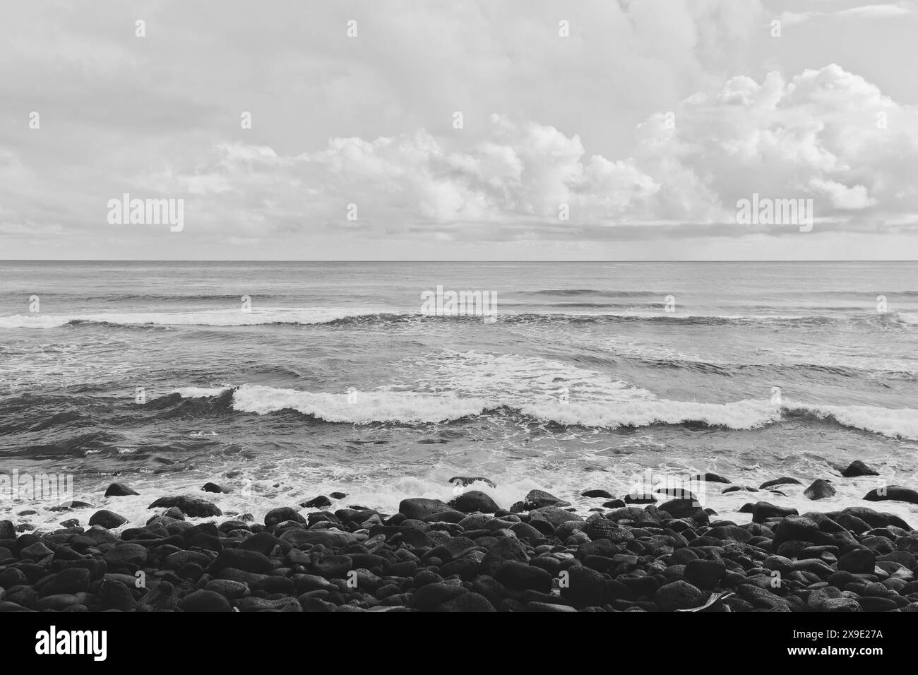Tropical ocean waves in Hawaii wash on moss covered rocks Stock Photo ...