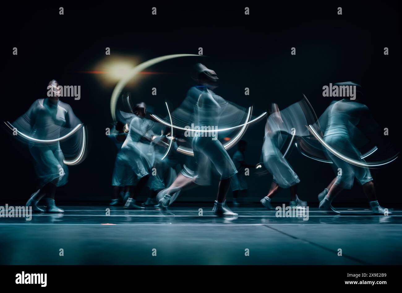 people dancing on stage lights energy Stock Photo - Alamy