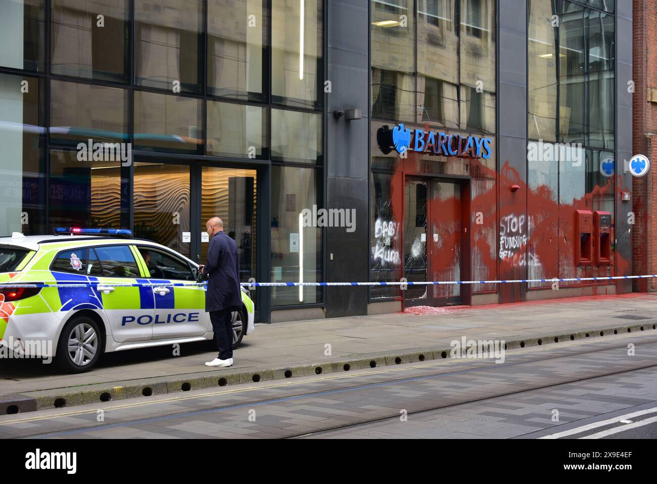 Barclays Bank, Mosley Street, central Manchester, UK, a glass door ...