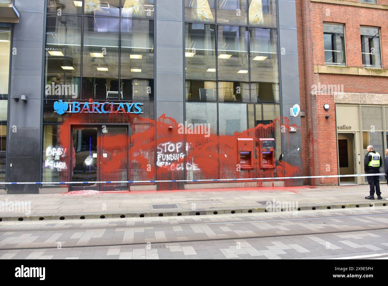 Barclays Bank, Mosley Street, central Manchester, UK, a glass door ...